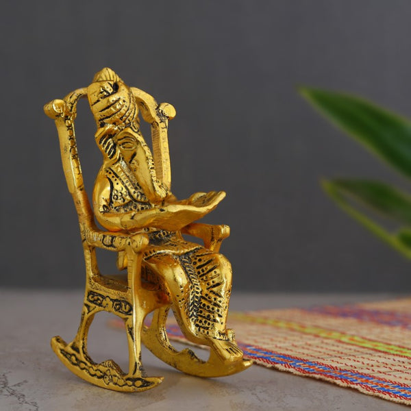 Lord Ganesha Idol Reading Book on Rocking Chair – Iklauti Creation